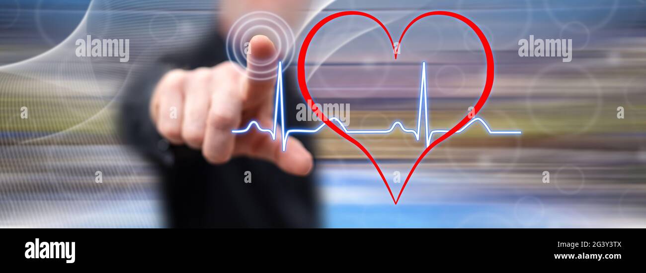 Man touching a heart beats graph on a touch screen with his finger ...