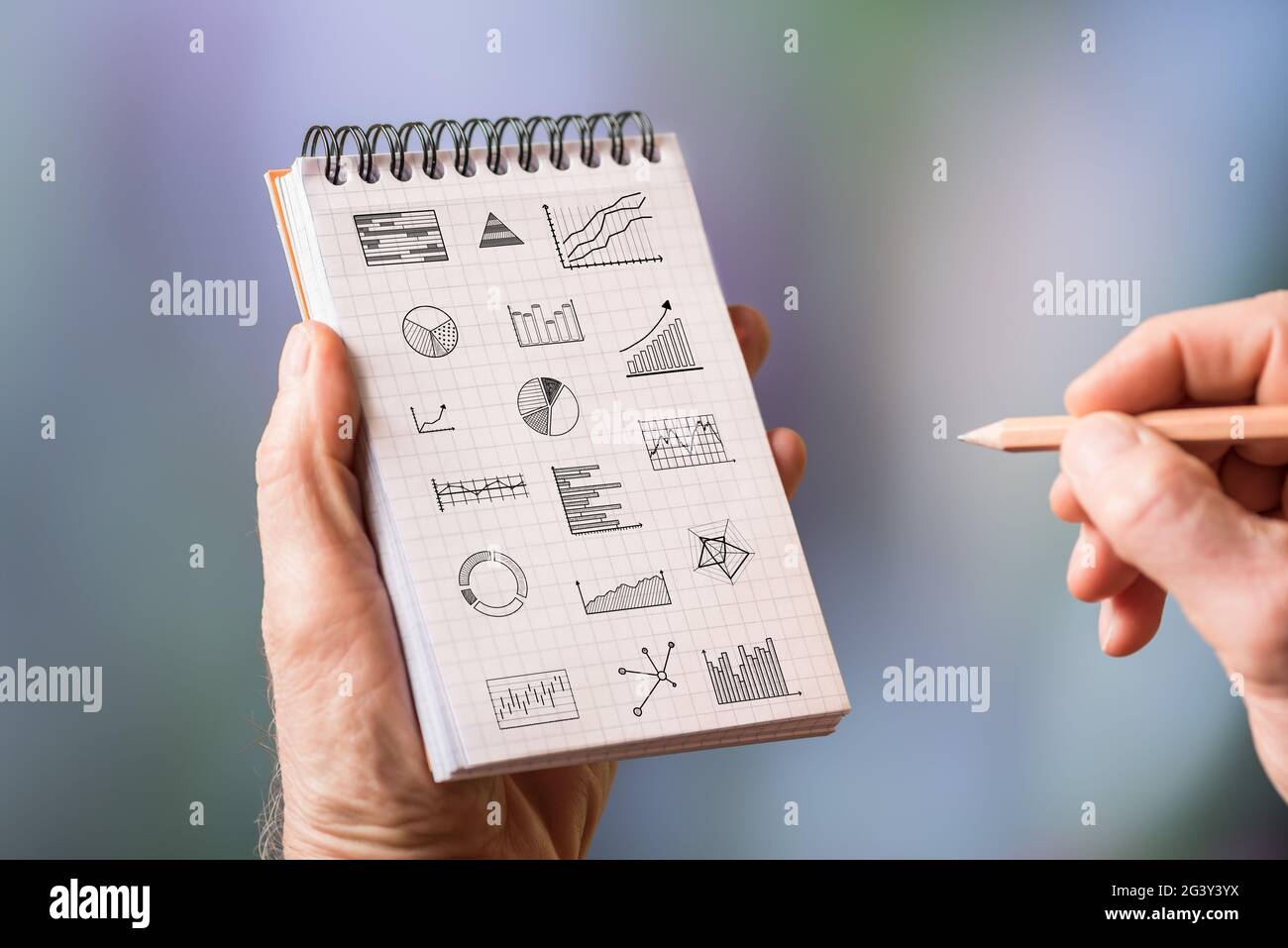 Hand drawing graphical analysis concept on a notepad Stock Photo - Alamy