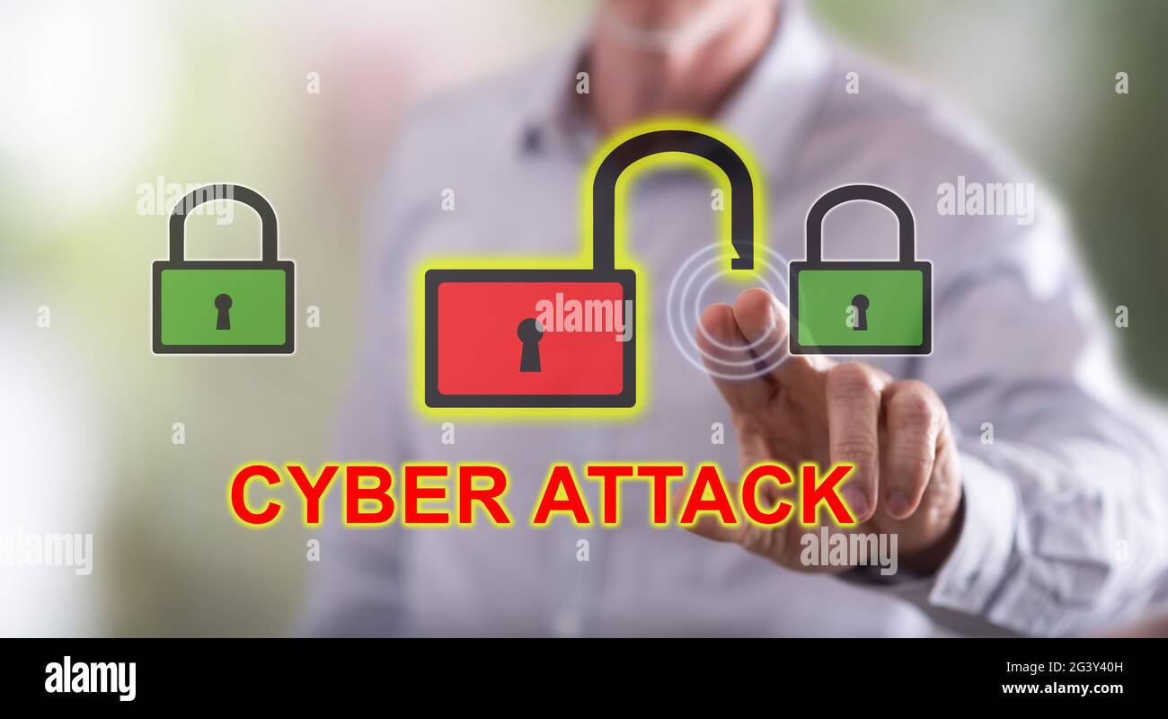 Man touching a cyber attack concept on a touch screen with his finger ...