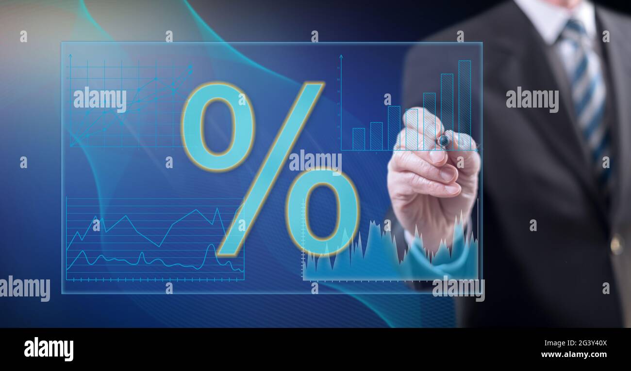 Man touching digital interest rates data on a touch screen with a ...