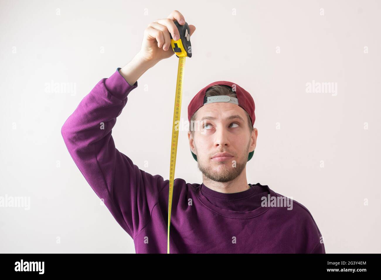 simple adult teenager male person with a roll tape measure the height ...