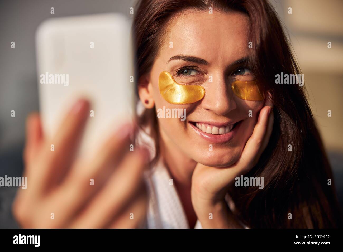 Portrait of pleased woman demonstrating her smile Stock Photo - Alamy