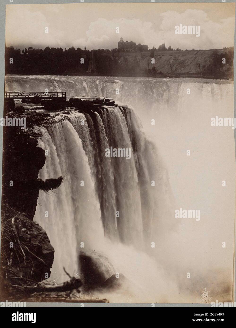 View of the Niagara Falls with buildings in the background Stock Photo ...