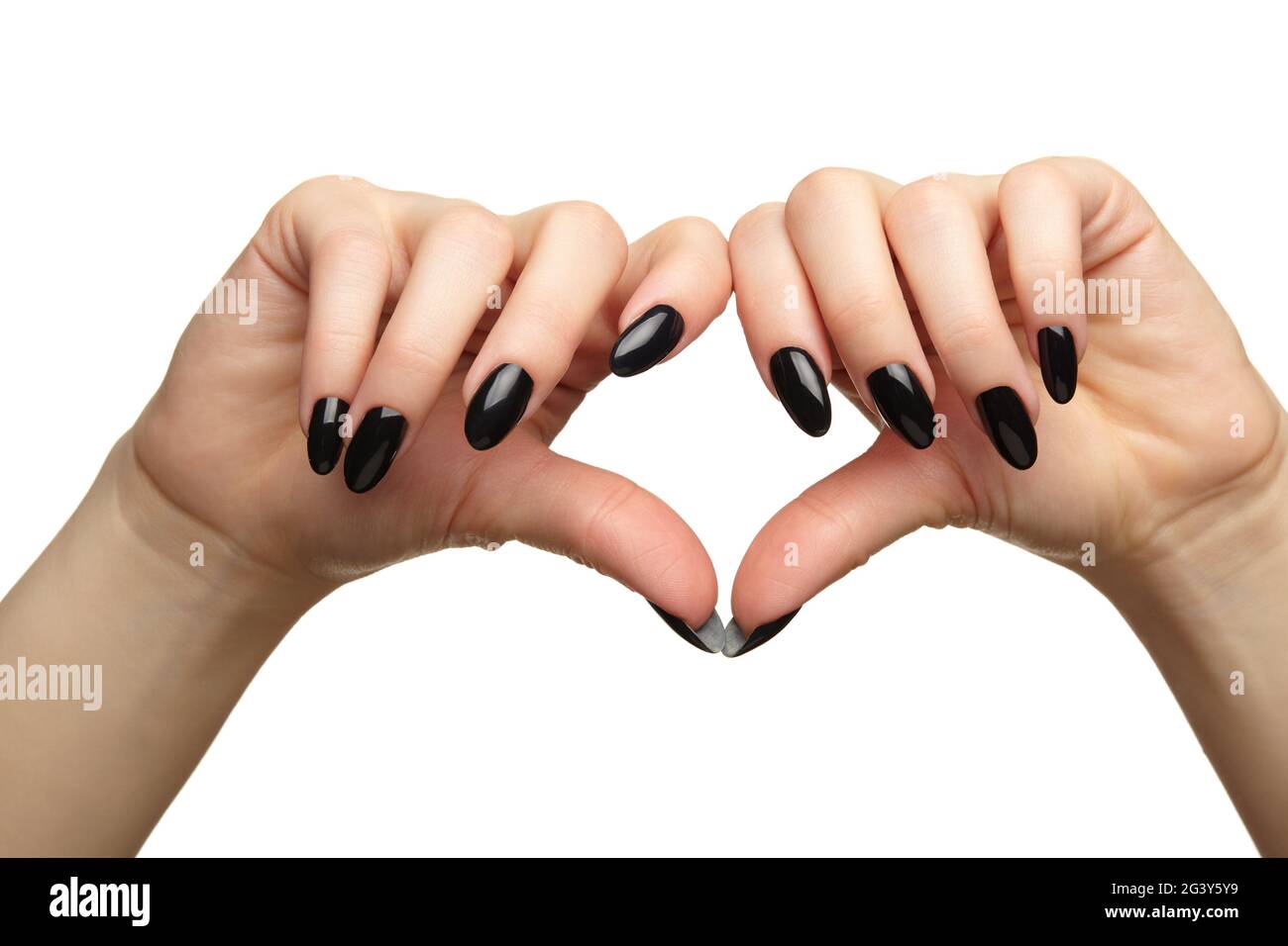Female hands with black nails manicure isolated on white background ...