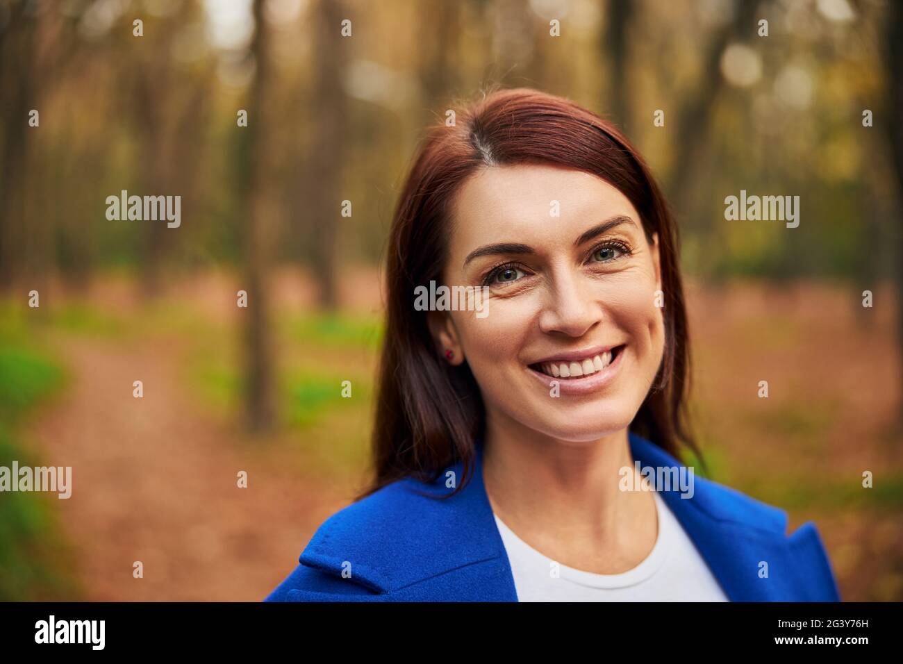 Portrait of delighted woman posing on camera Stock Photo - Alamy
