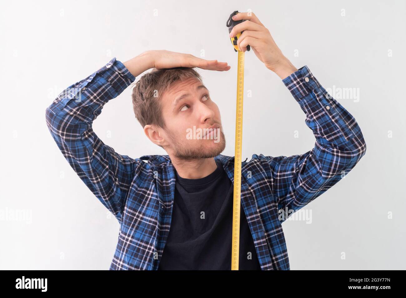 simple adult teenager male person with a roll tape measure the height ...