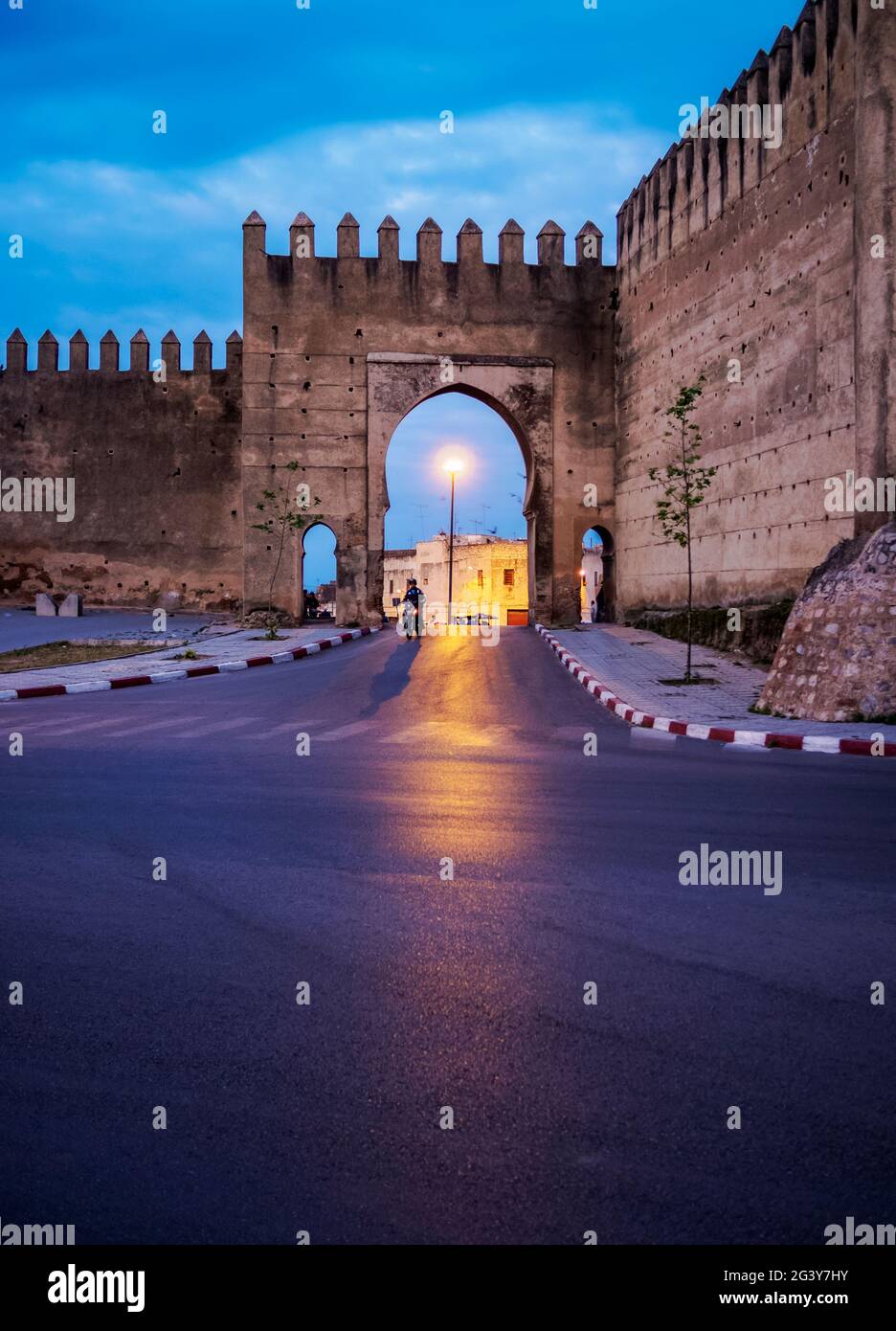 Gate in the walls of the Old Medina of Fes, dusk, Fez-Meknes Region ...