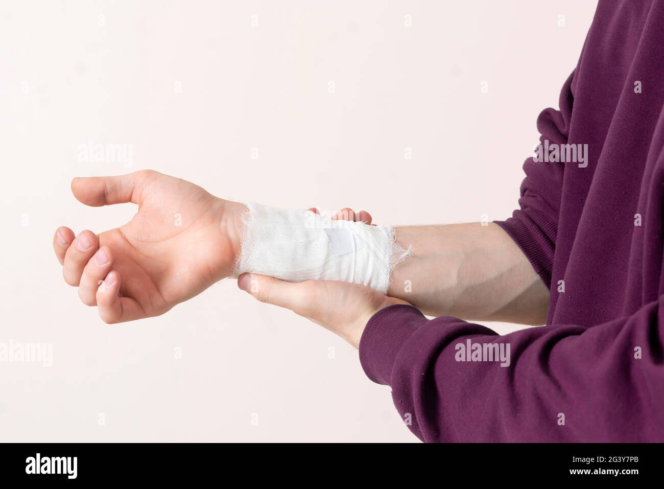 male person with a white bandage in the arm, medical pain and injury ...