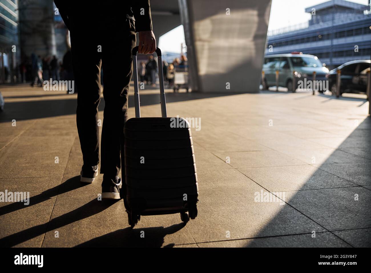 Traveler arriving in the city after pleasant journey Stock Photo - Alamy
