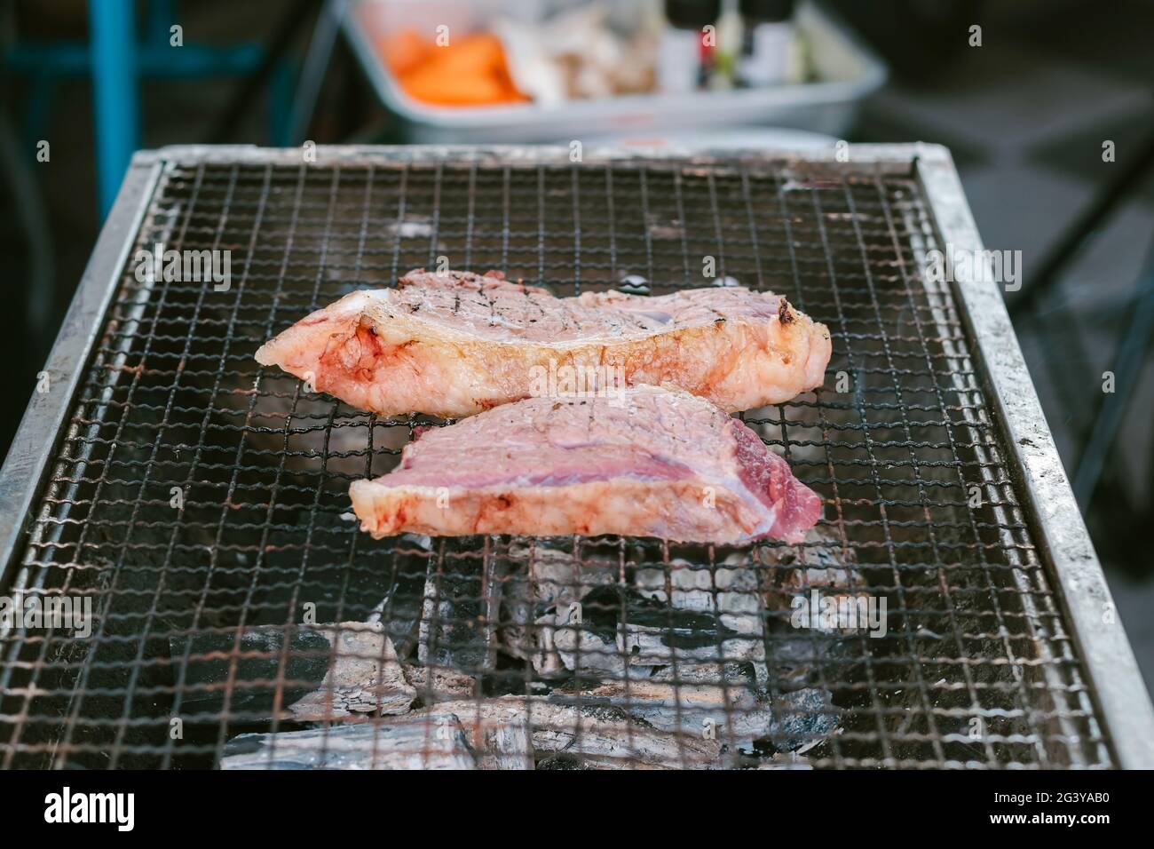 Closeup Grill the beef on the charcoal grill to cook steaks Stock Photo ...