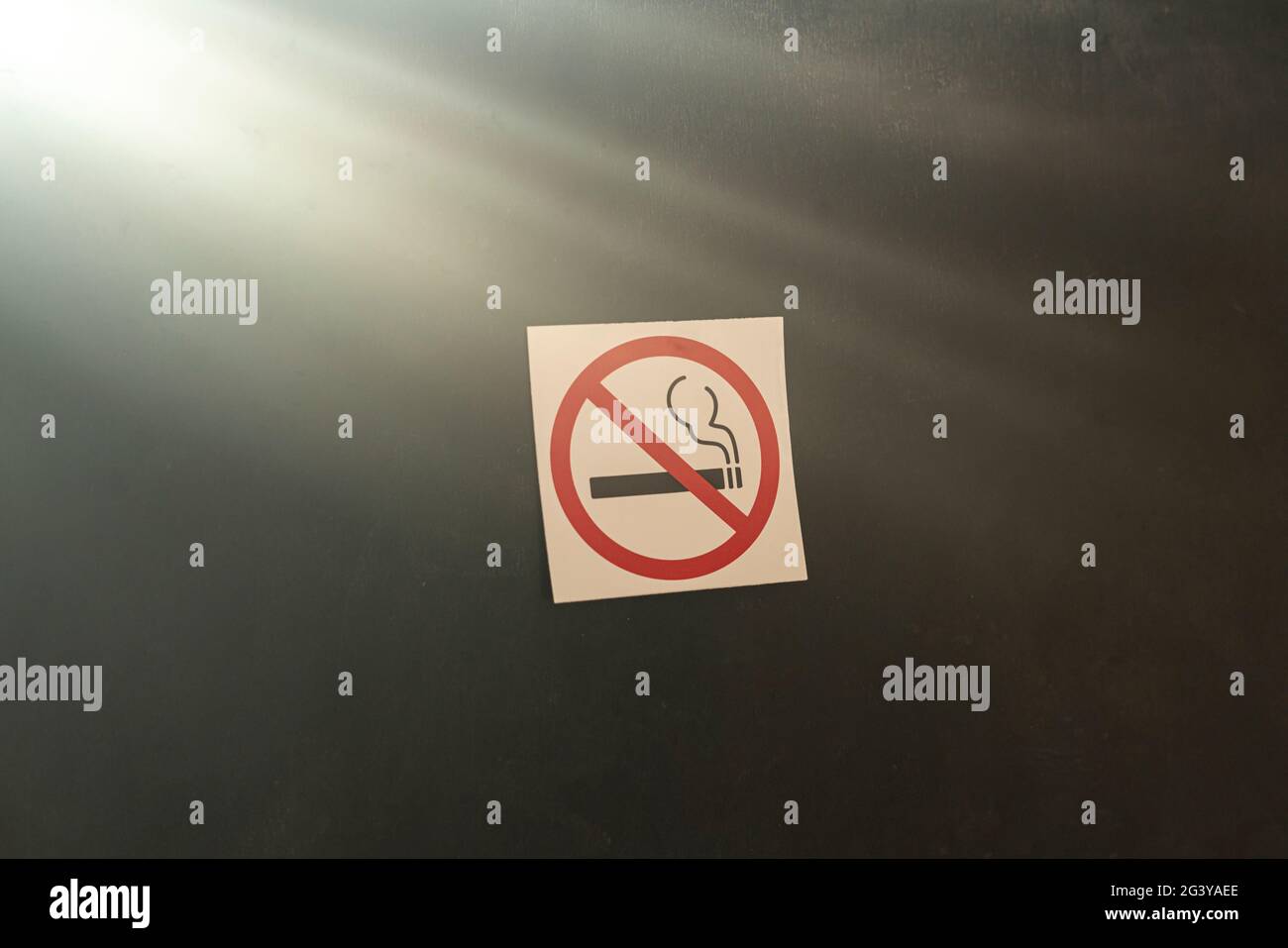 no smoking restriction sticker symbol area on the wall in public place ...