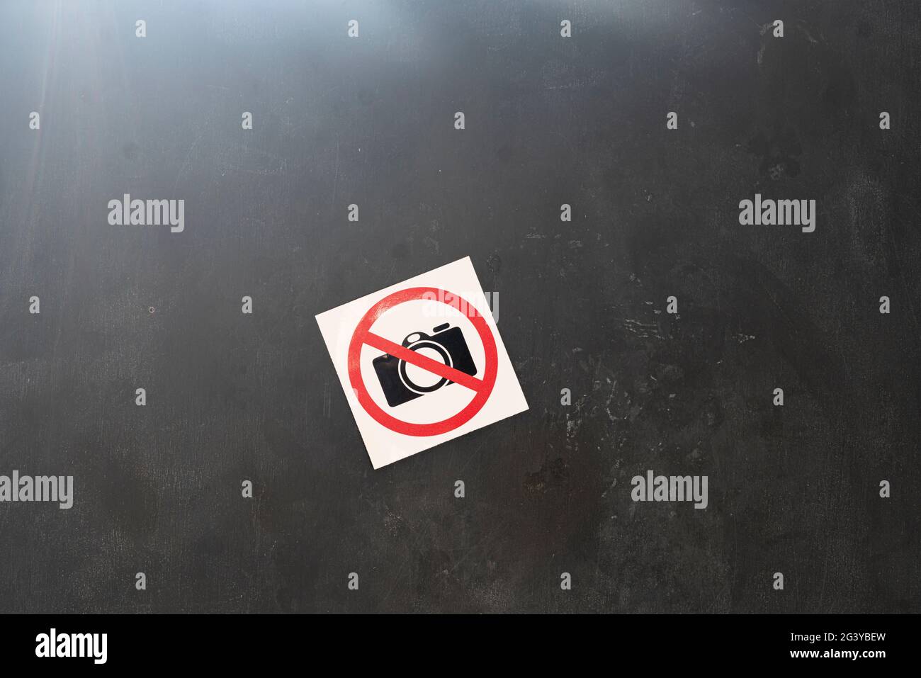 camera banned symbol icon sticker on the wall in public place, shooting ...