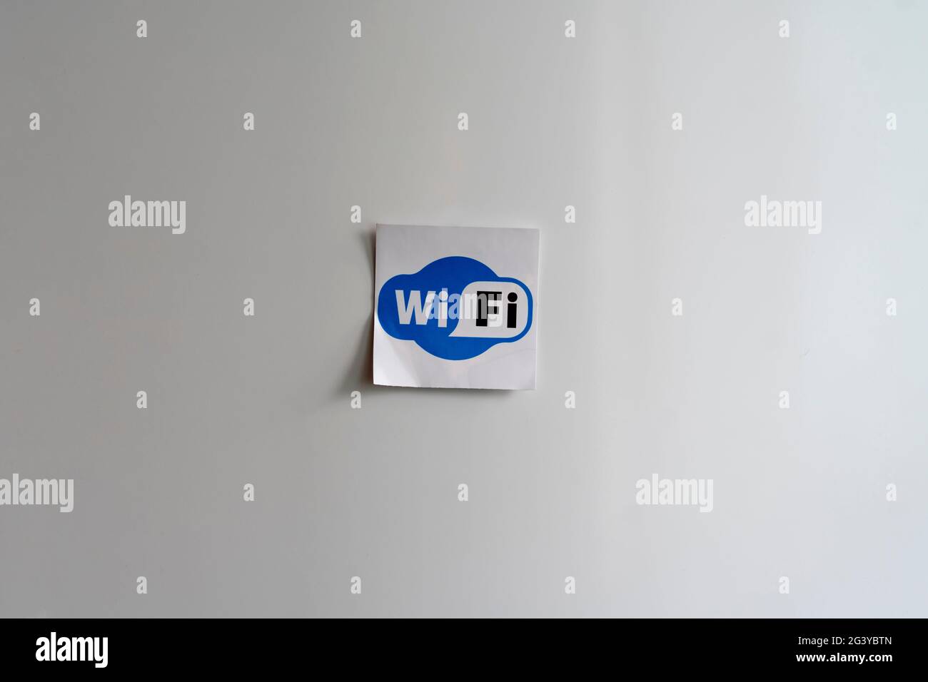 sign of wi-fi on the wall, abstract sticker attached in public place ...