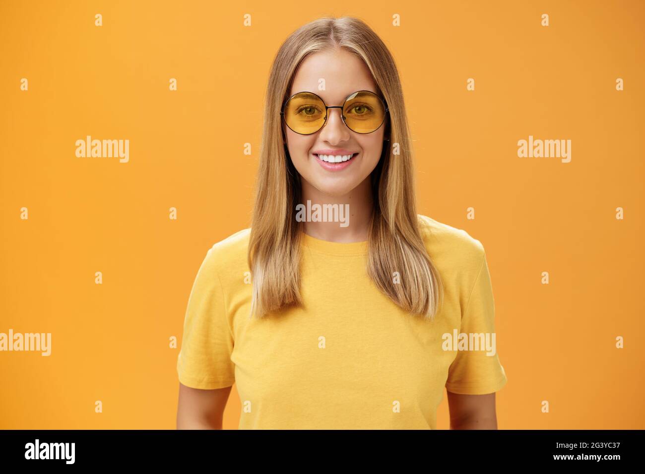 Stylish self-assured charming european woman with fair hair and tanned ...