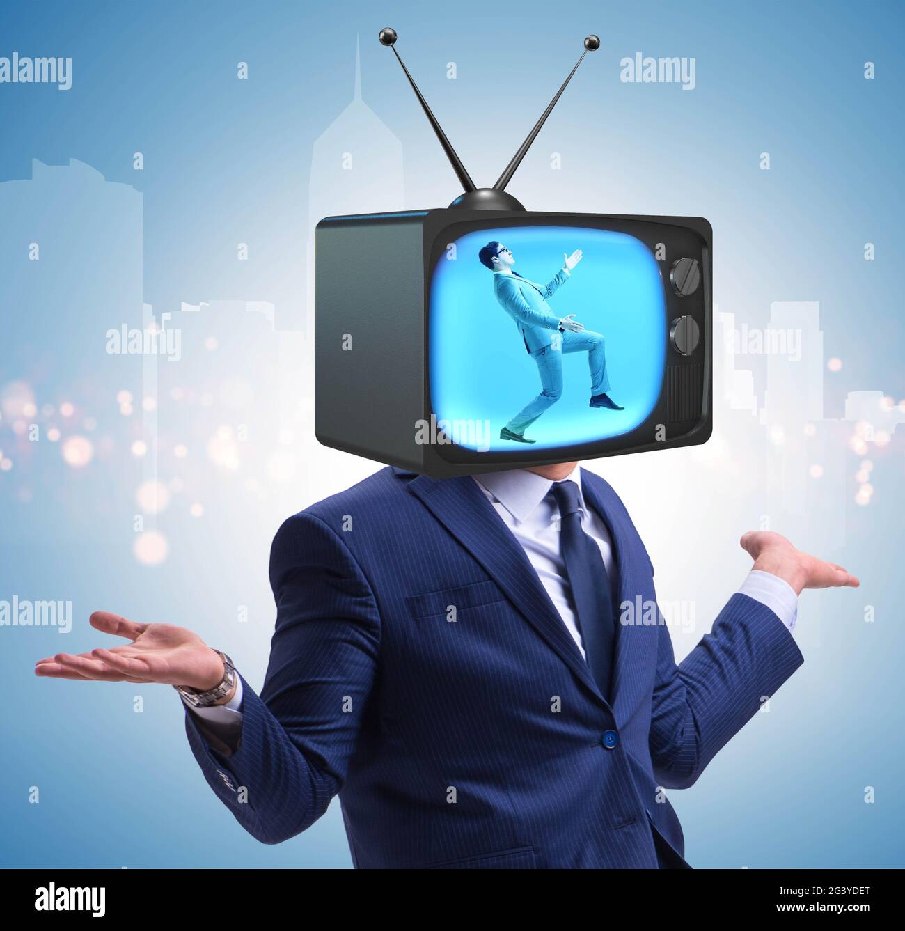 Man with television head in tv addiction concept Stock Photo - Alamy