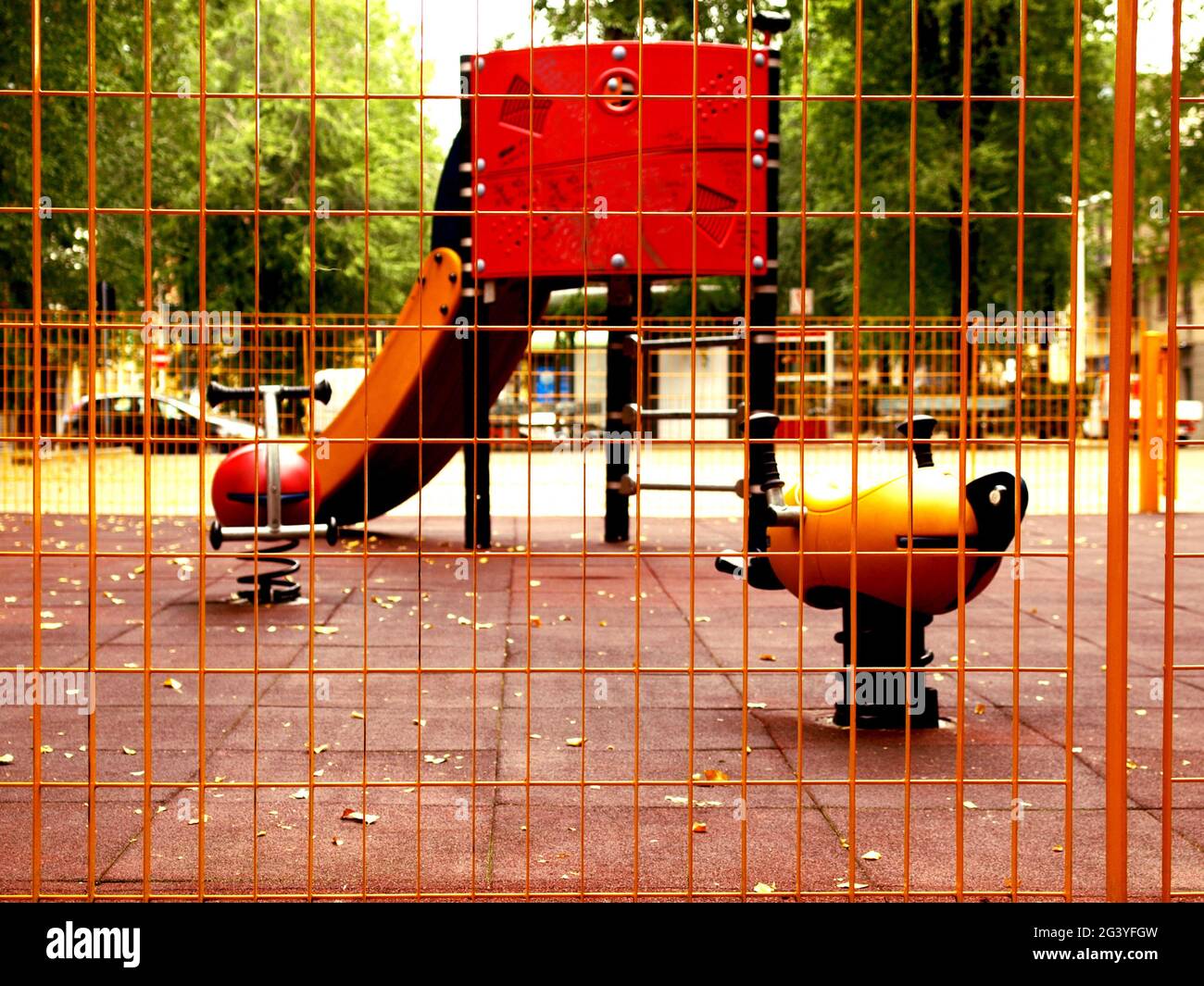 Children playground at sunset Stock Photo - Alamy