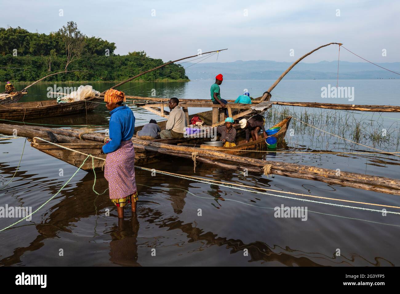 People unload the catch of sambaza fish caught by singing fishermen on ...