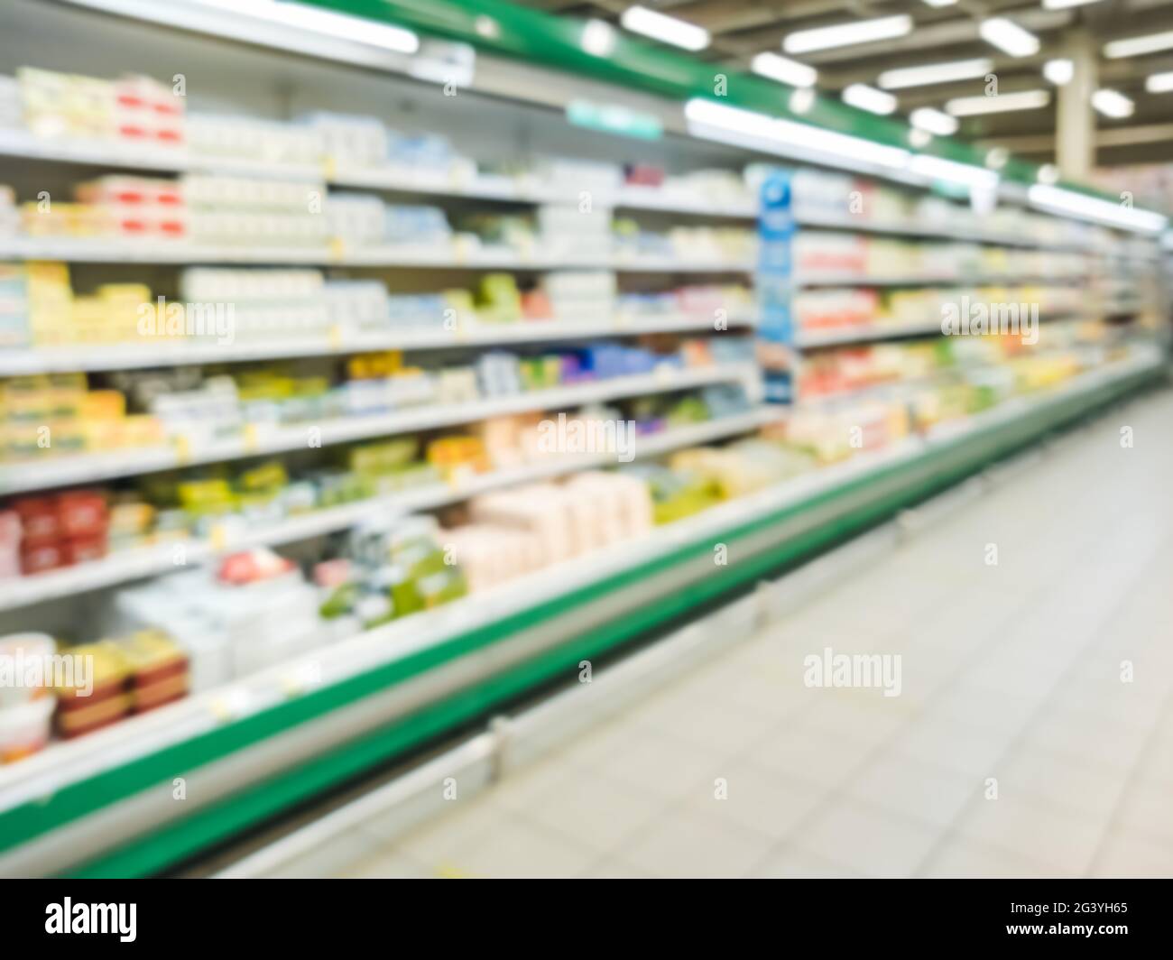 Abstract blurred supermarket aisle Stock Photo - Alamy