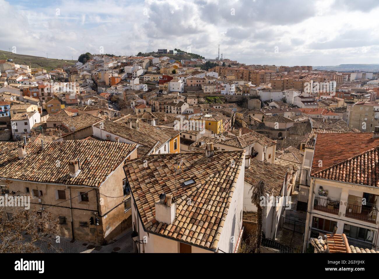 A view of the rooftops and colorful houses of the old city center of ...