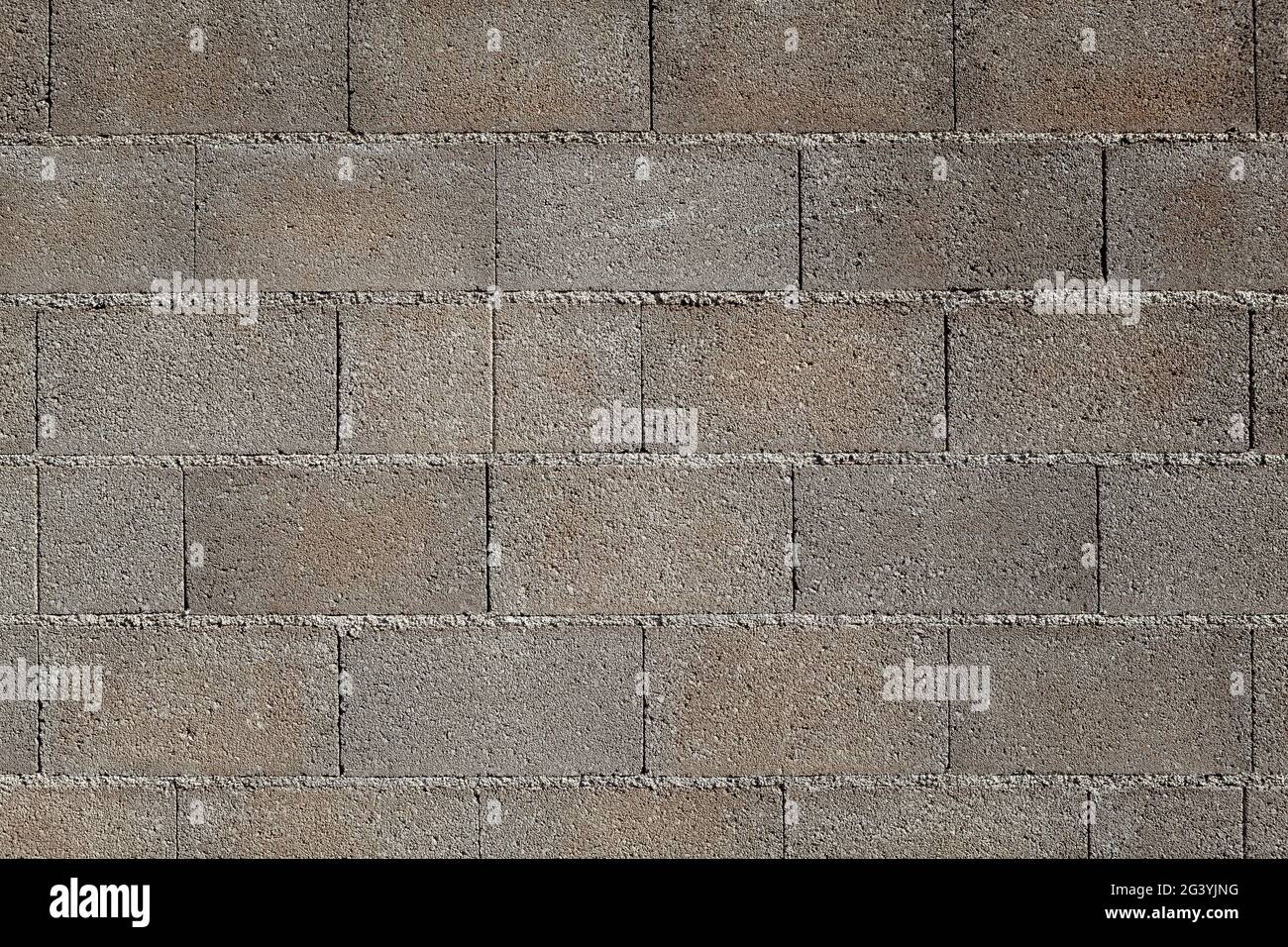 Wall made of concrete blocks Stock Photo - Alamy