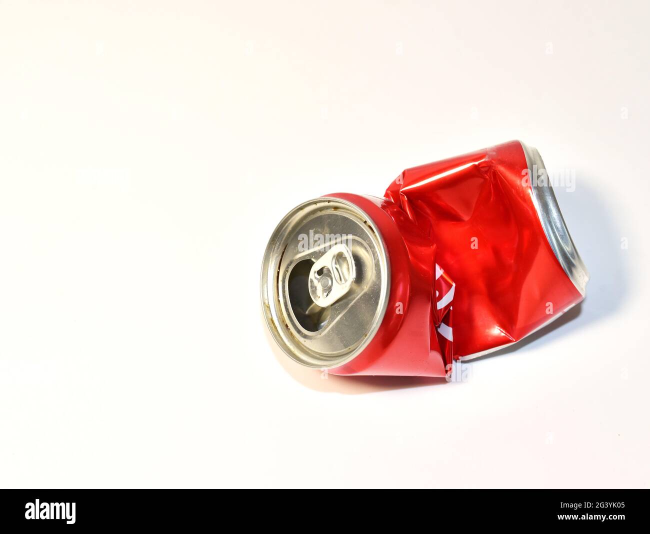 Empty crumpled can from a sweet carbonated drink. Aluminum can trash ...