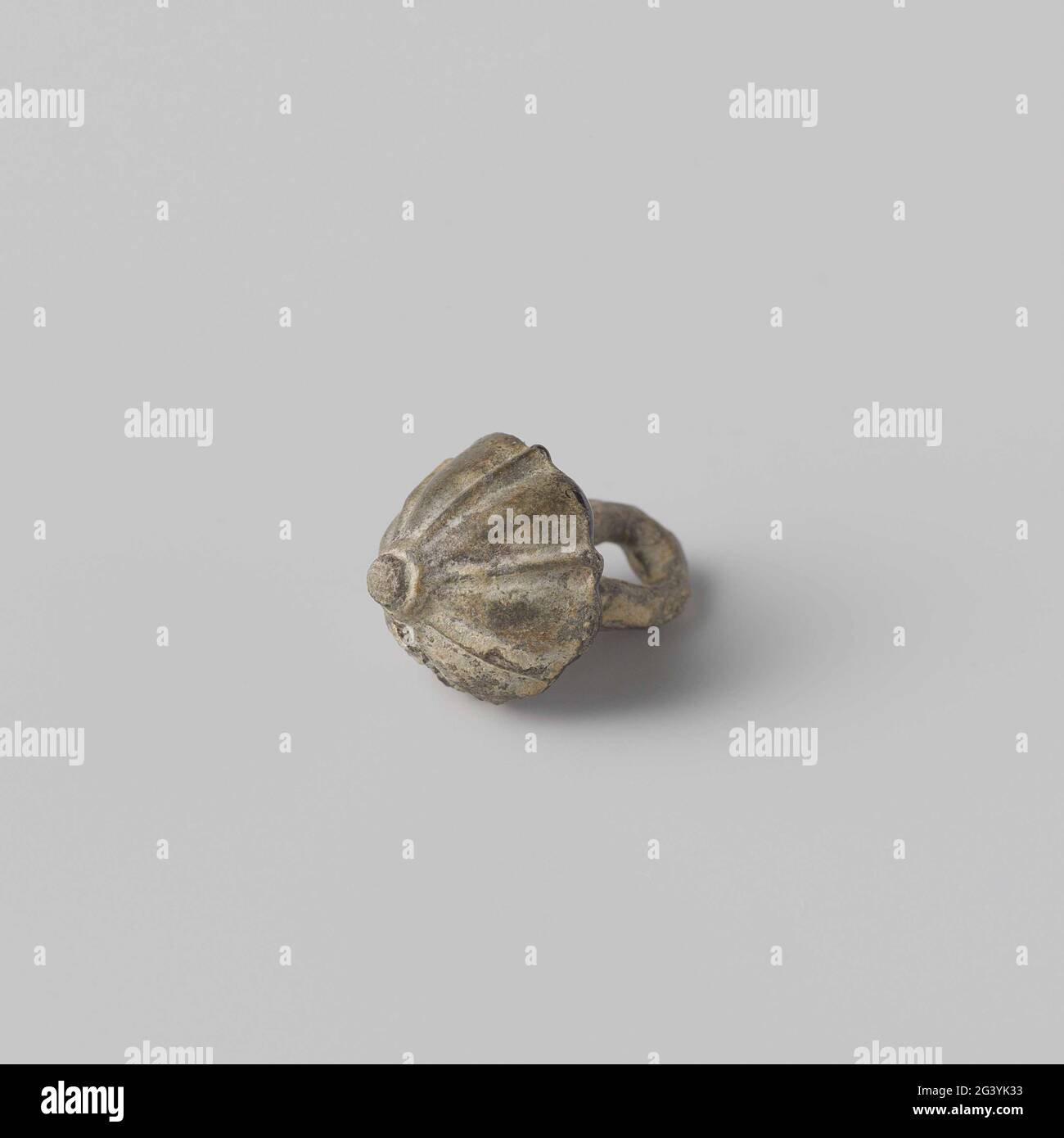 Button, conical with ribs and leafy eye. Knot, conical shape with six ...