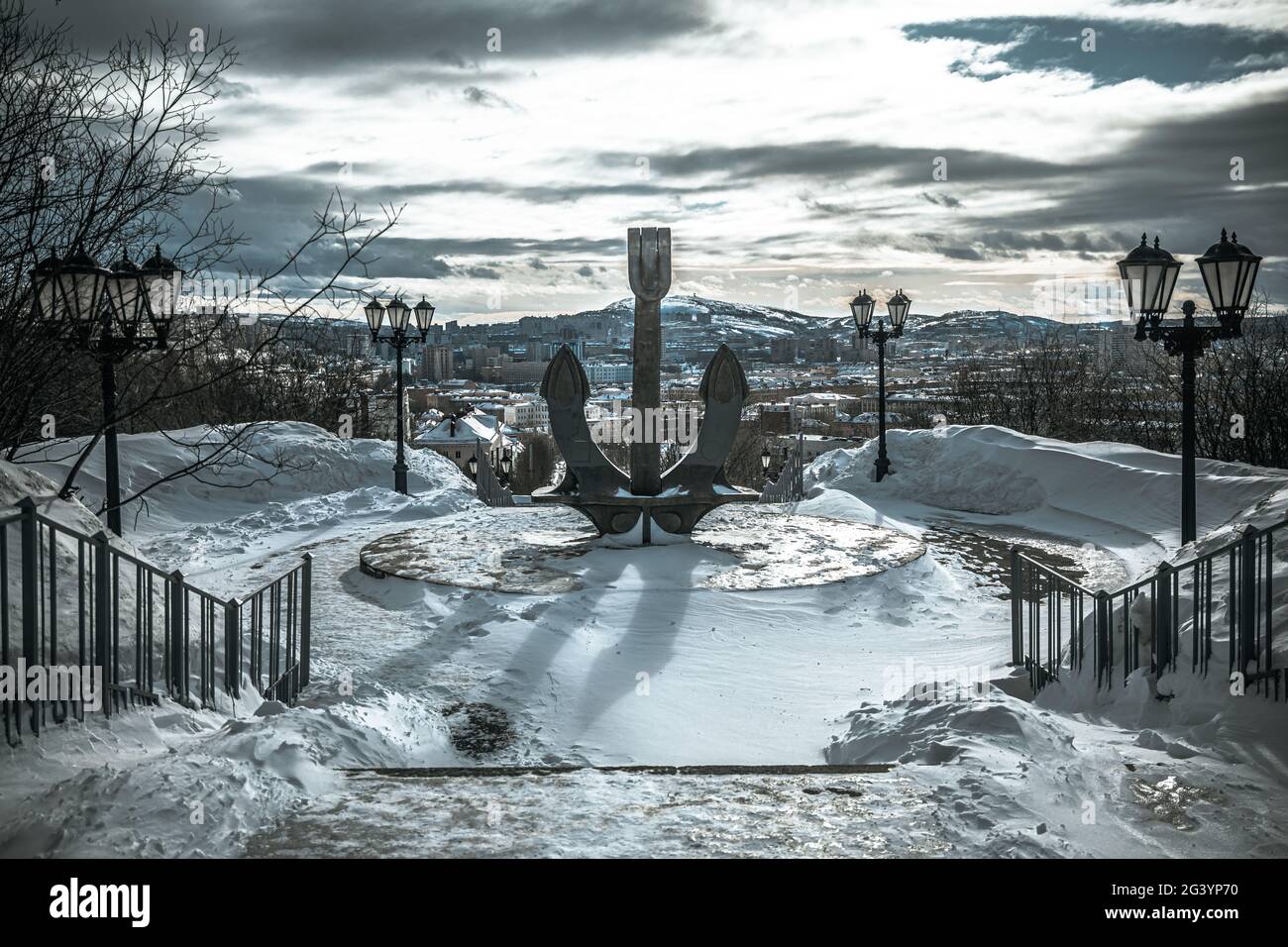 View of the anchor and the city of Murmansk with mountains in the ...