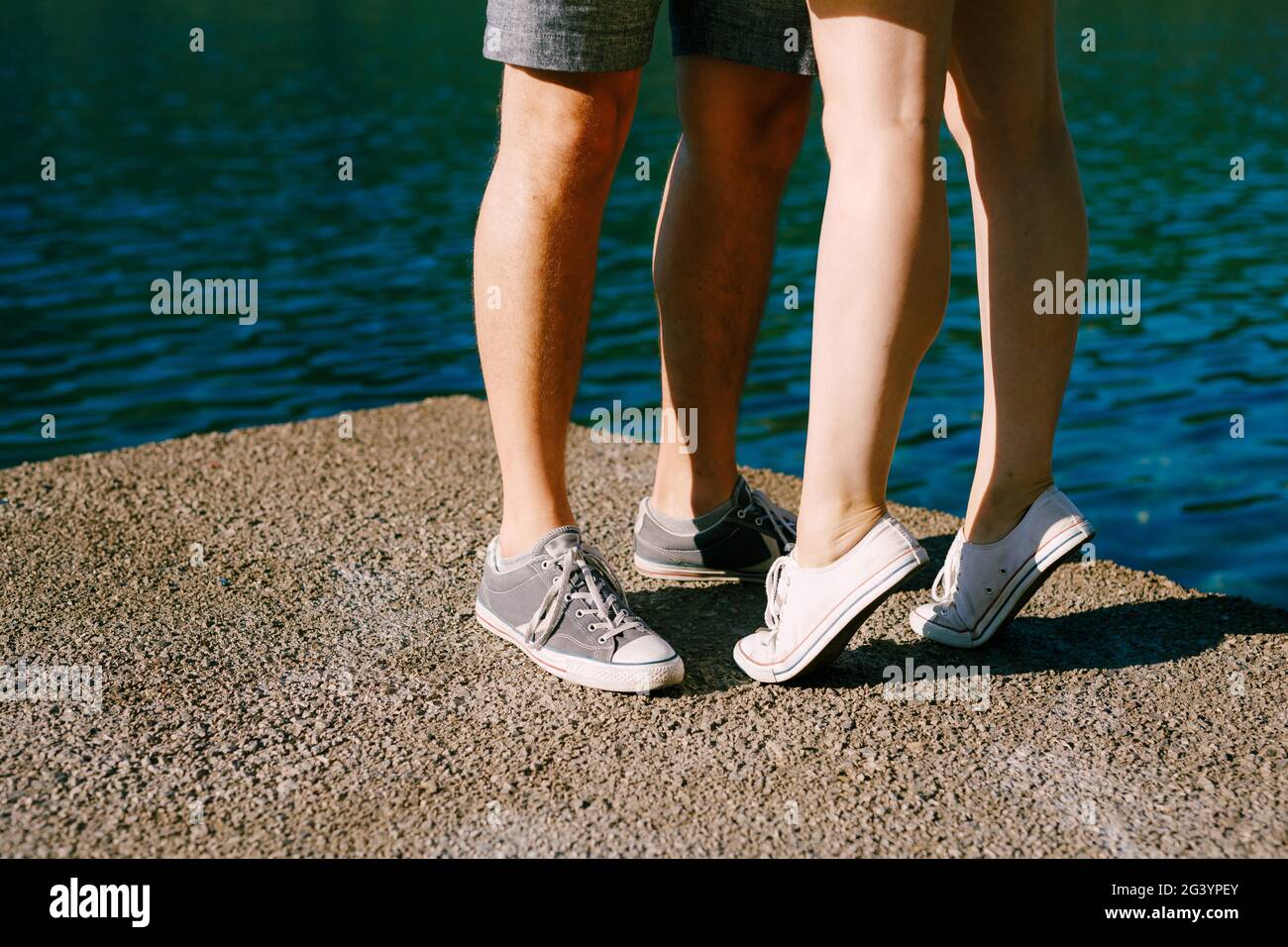 Man standing feet water hi-res stock photography and images - Alamy