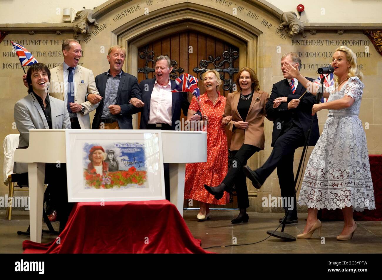 Virginia Lewis-Jones (middle) takes part in singing at the launch of an ...