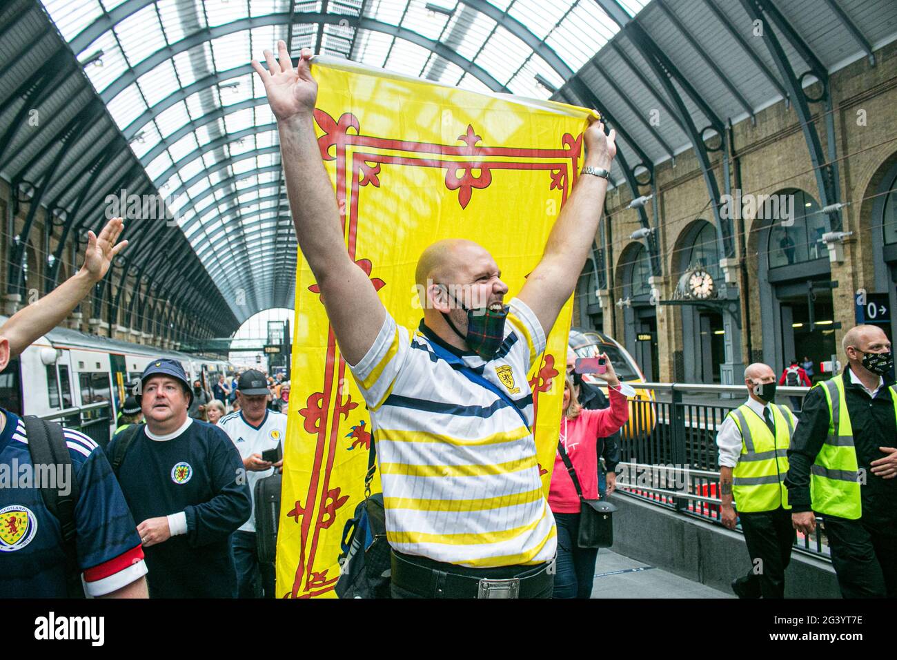 Football fans arrive by train hi-res stock photography and images - Alamy