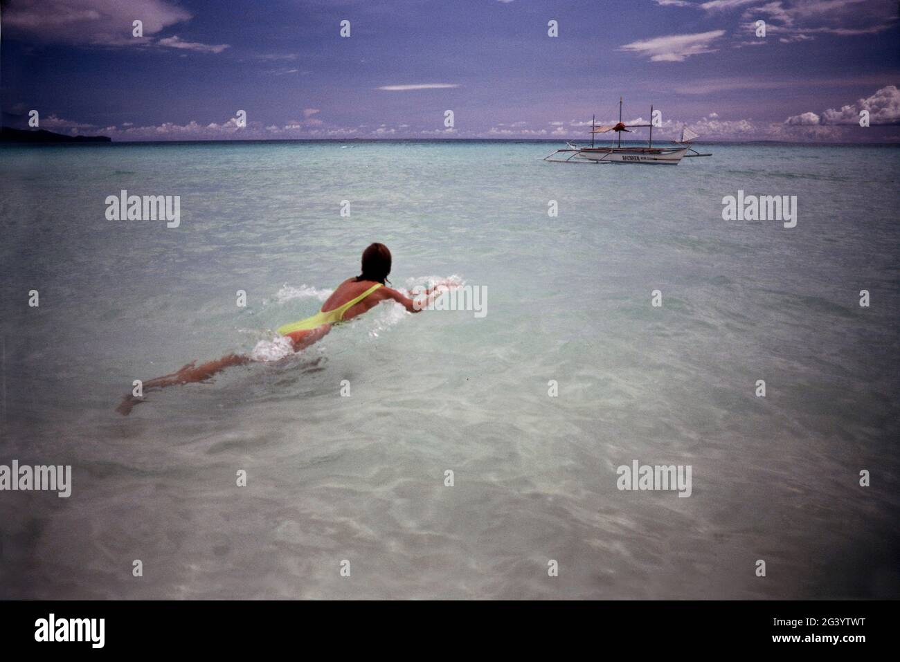 Female beach model in one piece bathing suit in Boracay Philippines on ...