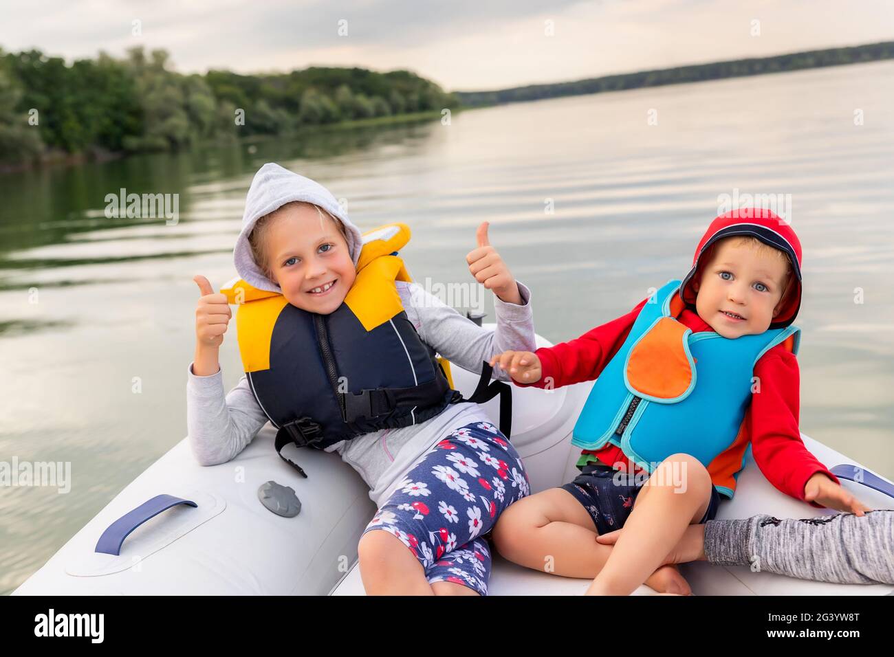 Girl on inflatable boat hi-res stock photography and images - Alamy