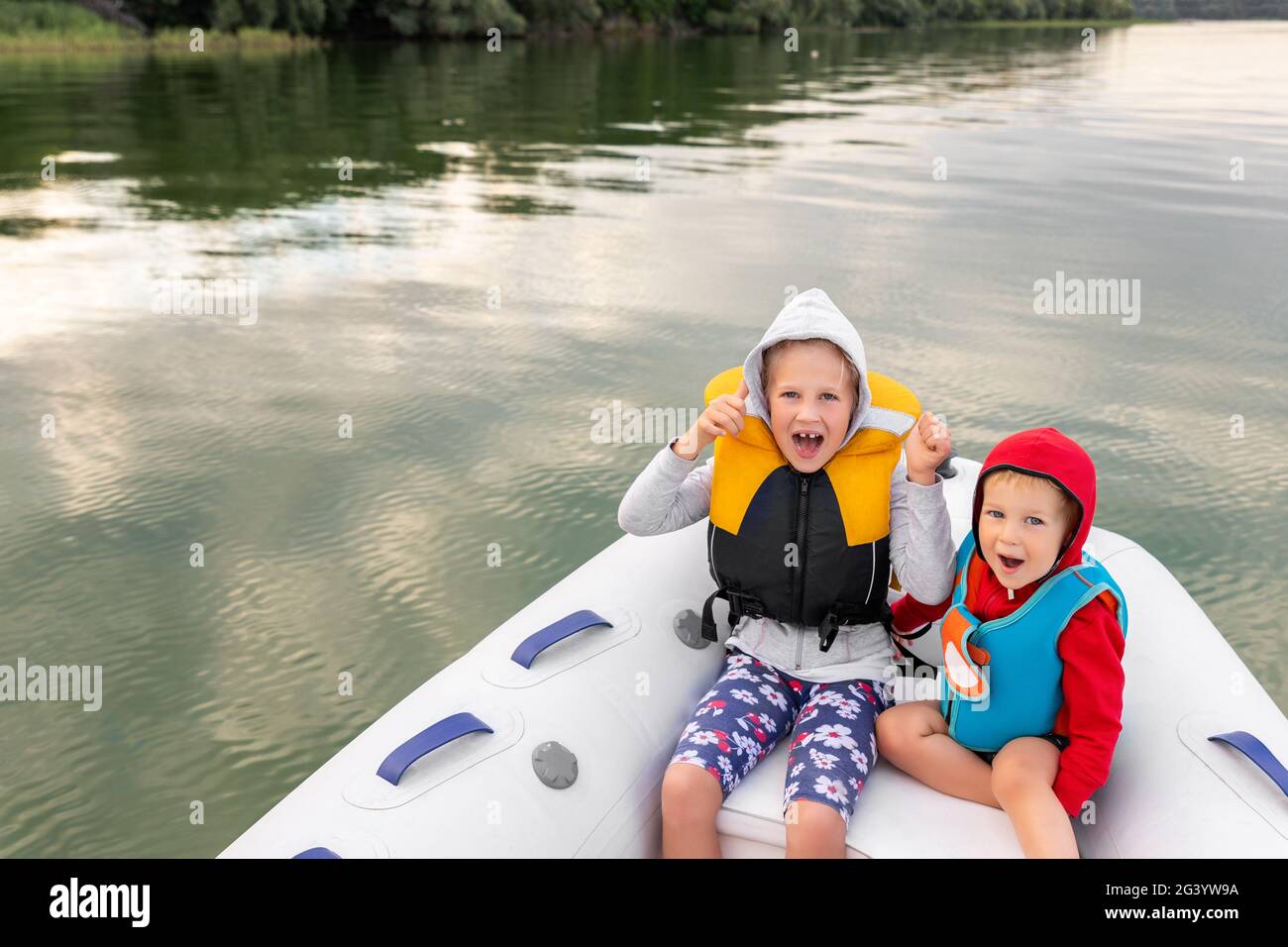 Girl on inflatable boat hi-res stock photography and images - Alamy