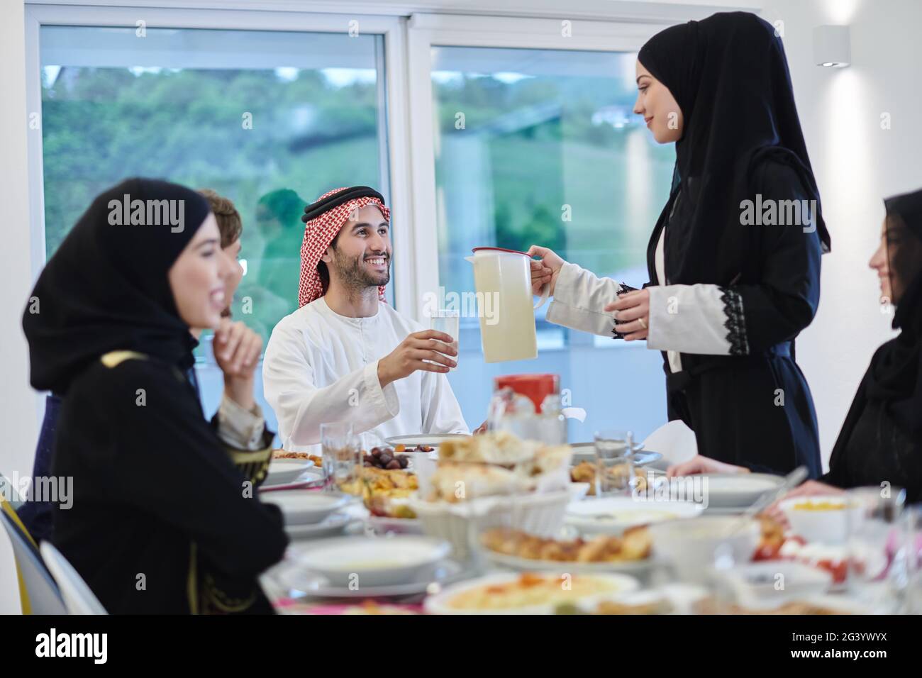 Muslim family having iftar together during Ramadan Stock Photo - Alamy