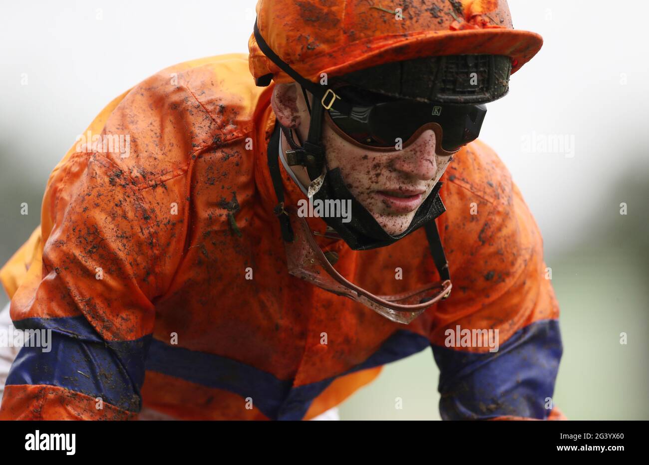 Jockey Gavin Ryan covered in mud during day four of Royal Ascot at ...