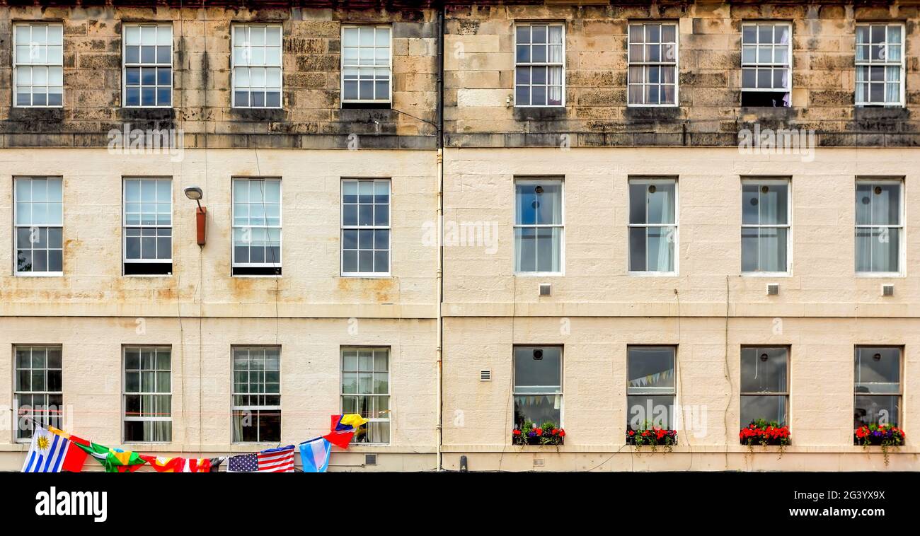 Facade old building flags hi-res stock photography and images - Alamy