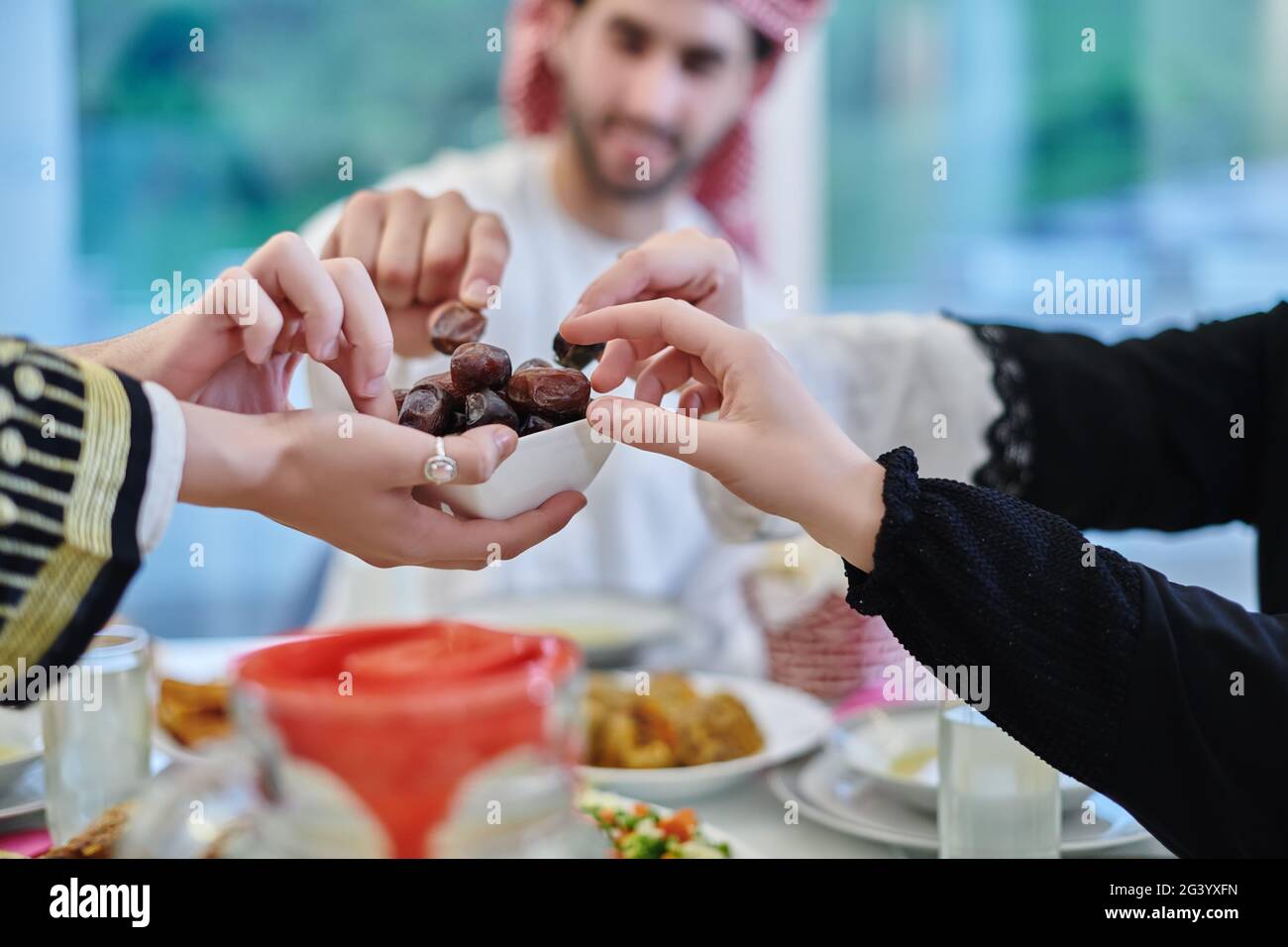 Muslim family having iftar together during Ramadan Stock Photo - Alamy