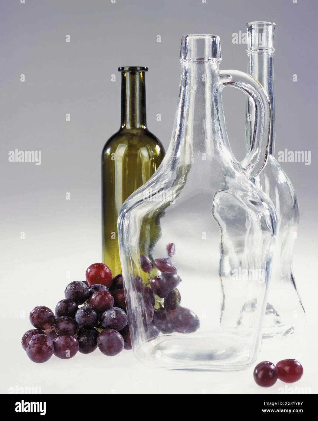 Still Life With Glasses And Grapewine Stock Photo - Alamy