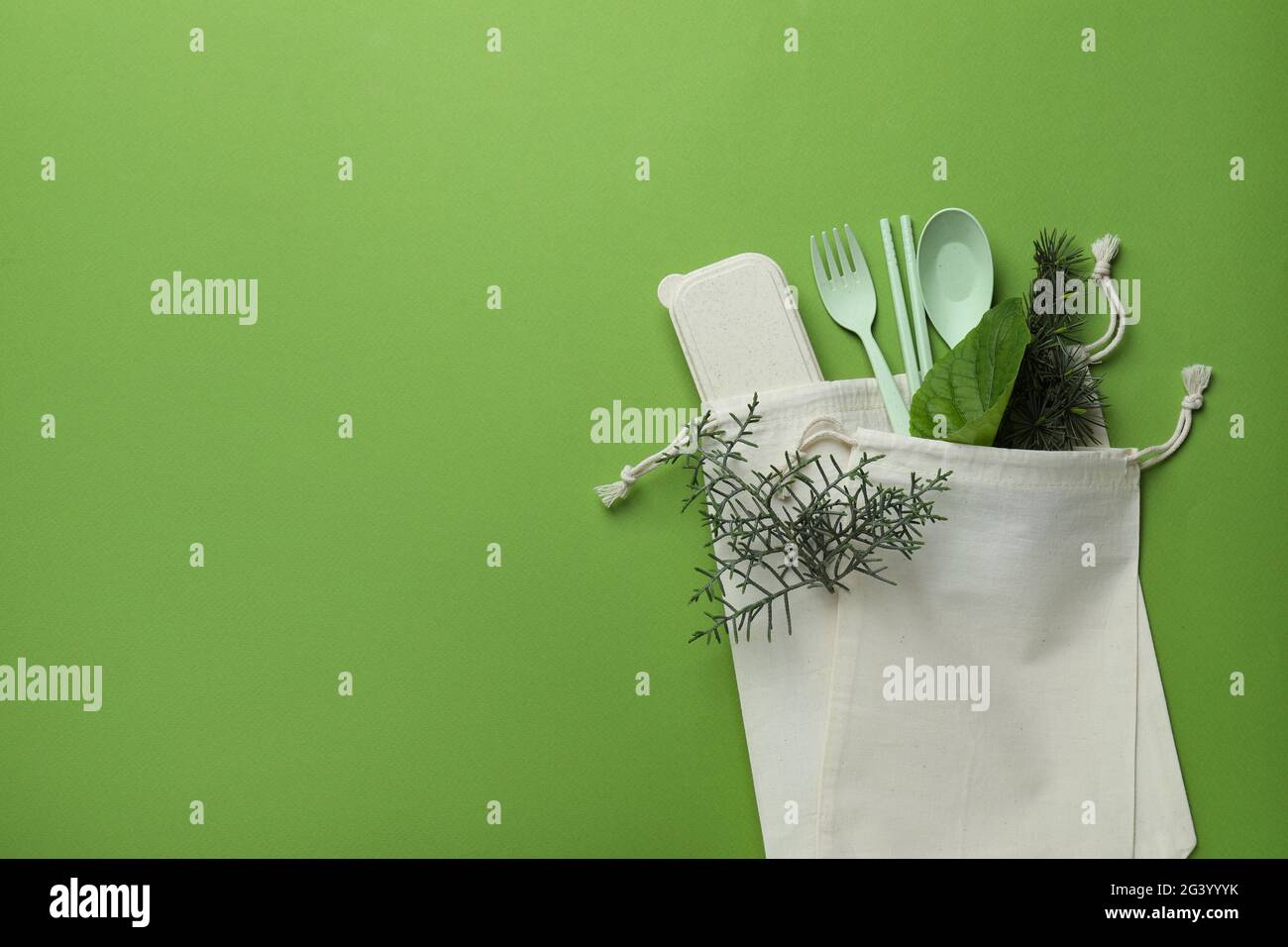 Eco friendly zero waste concept on green background Stock Photo - Alamy