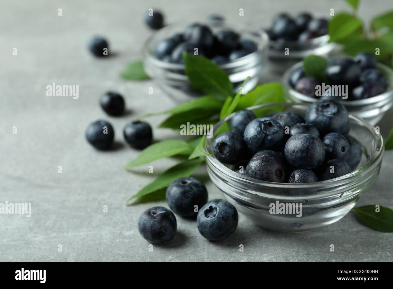 Fresh berry concept with blueberry on gray textured table Stock Photo ...