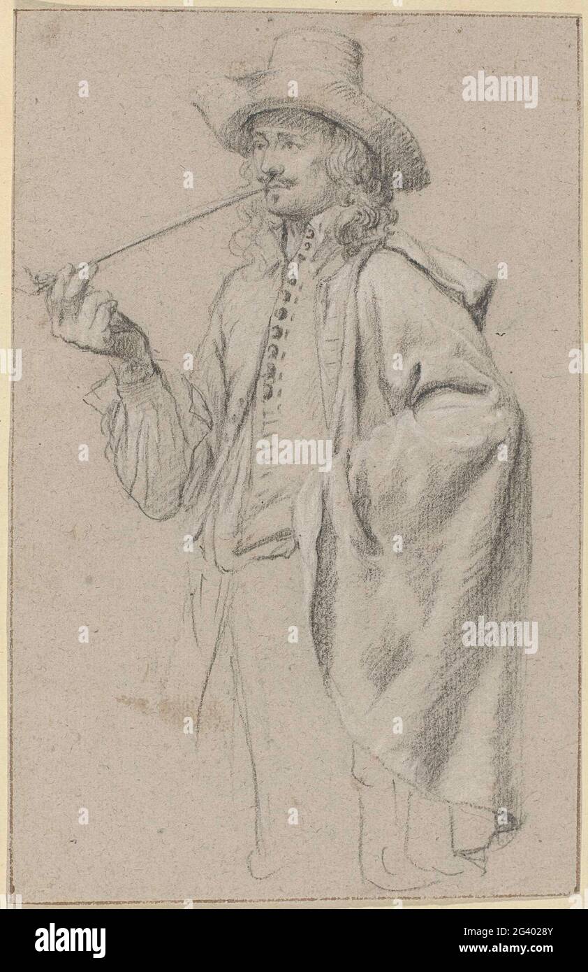 Piping man with hat and cape Stock Photo - Alamy