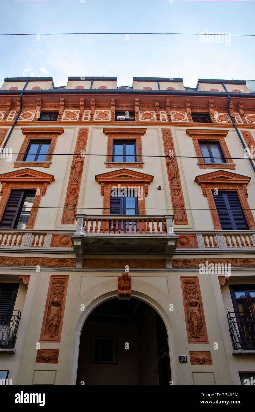 Details of a facade of an old Milan style building. Via Bramante ...