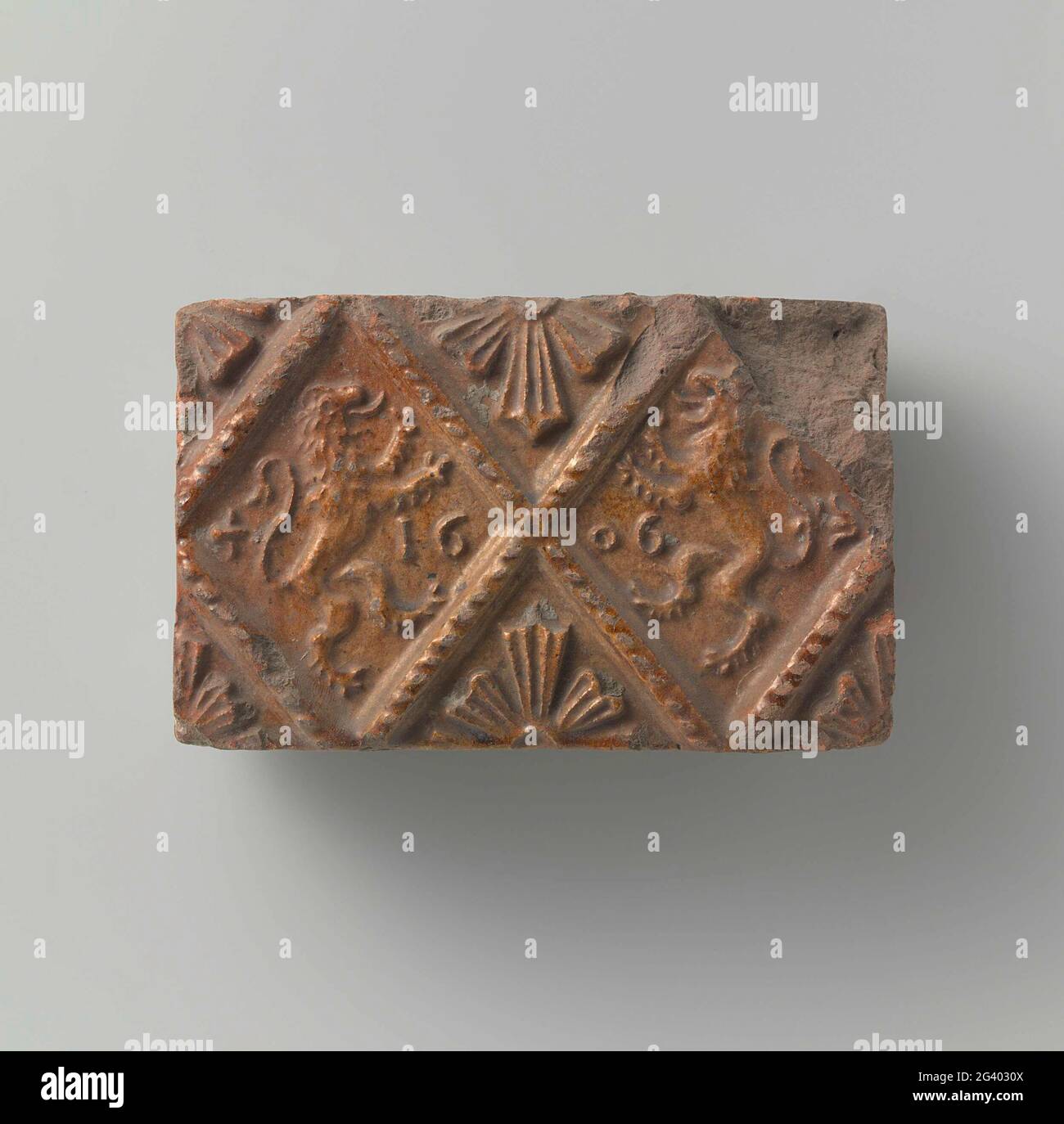 Firepage, glazed. Fireplace, glazed, with two climbing lions and the ...