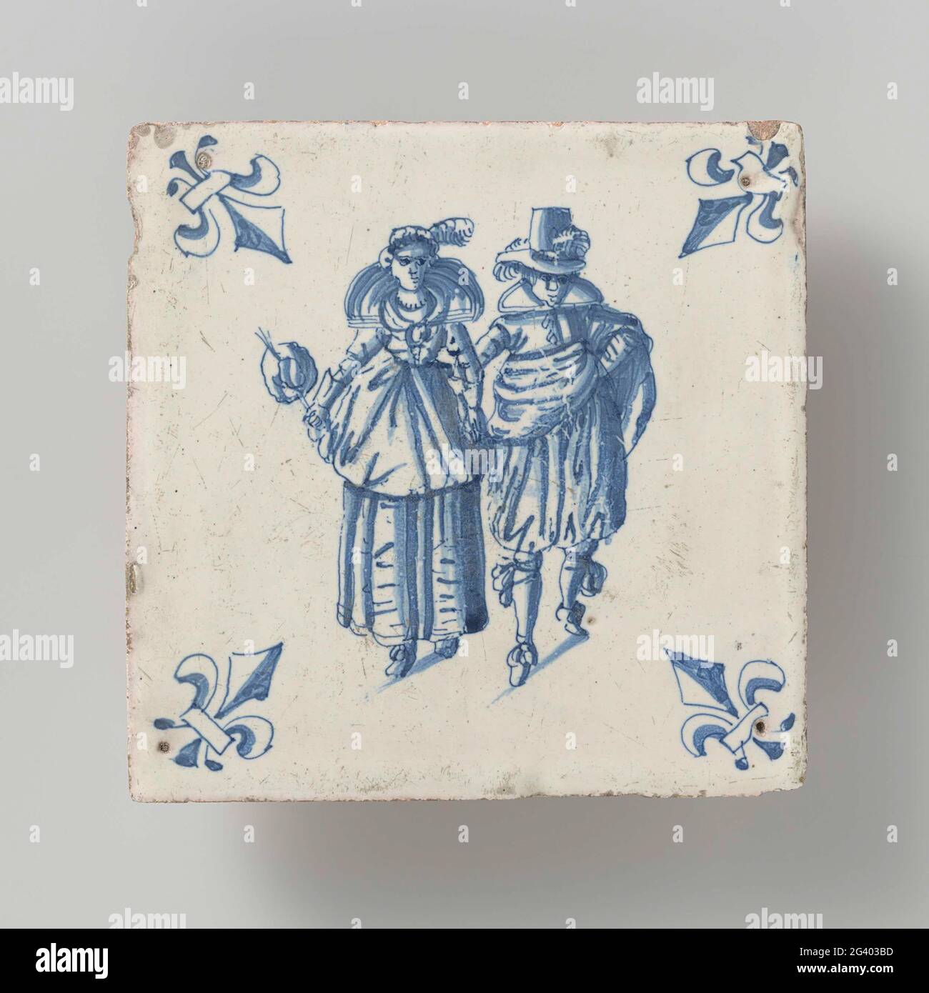 Tile with man and woman. Tile with a blue painted man and woman ...