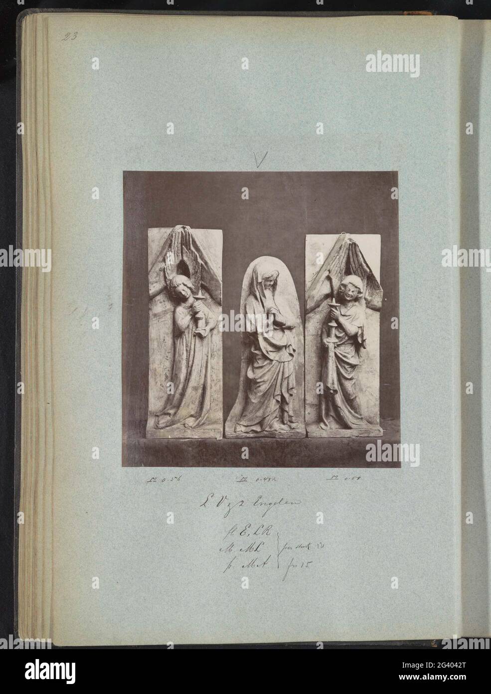 Three sculptures of angels Stock Photo - Alamy