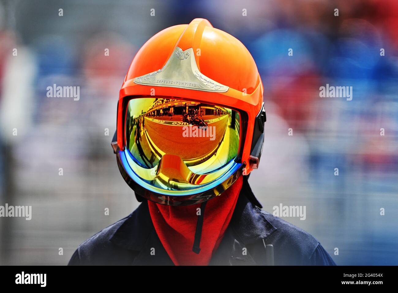 Alpine f1 team a521 reflected in a fire marshals helmet hi-res stock ...