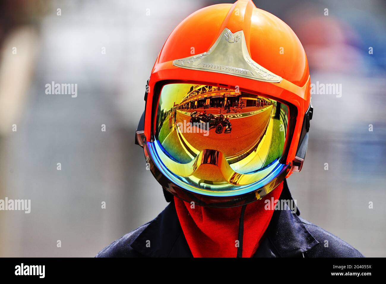 Mercedes amg f1 w12 reflected in fire marshals helmet visor hi-res ...