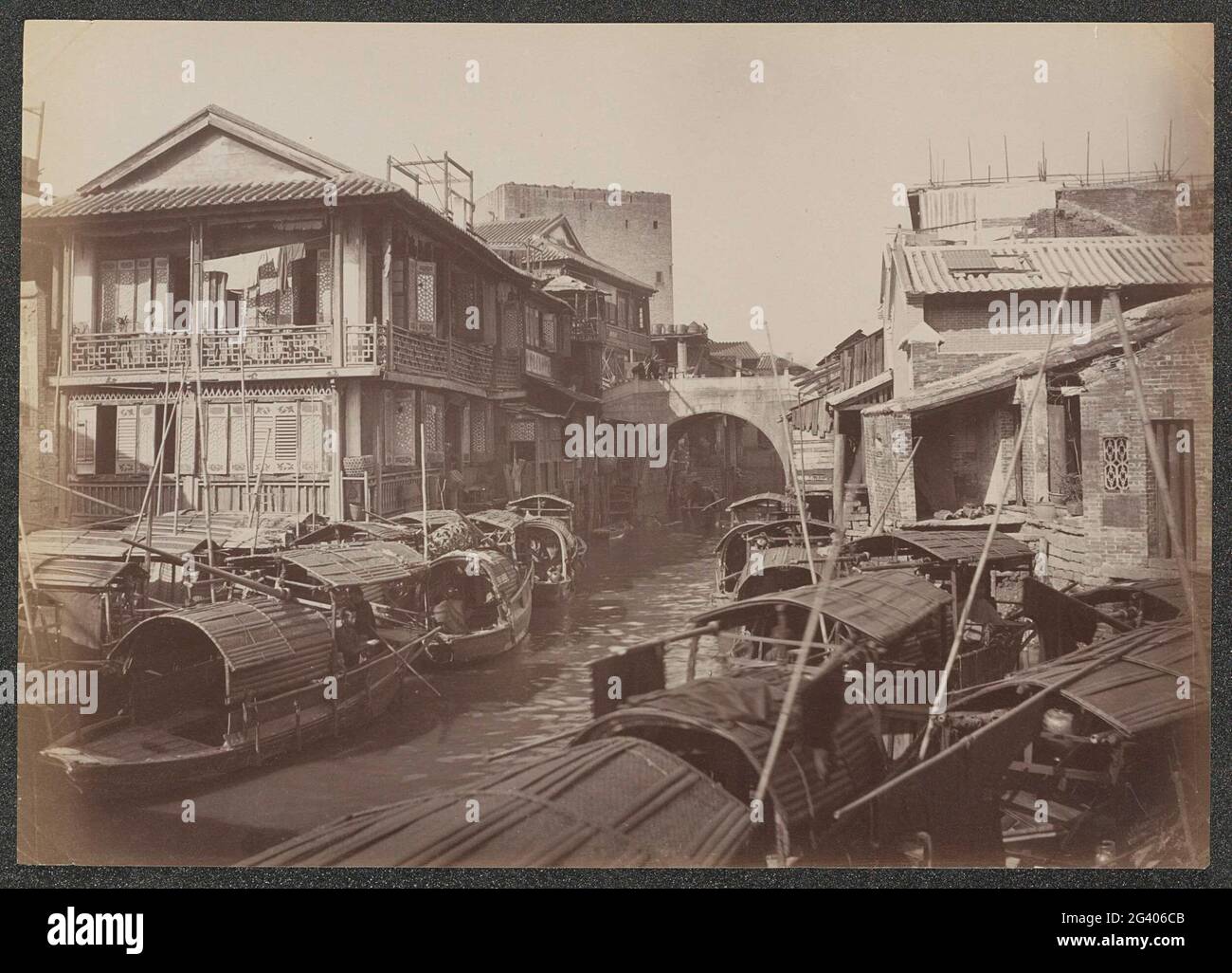 Boats and houses in canton. Part of album with 50 photos of a trip ...