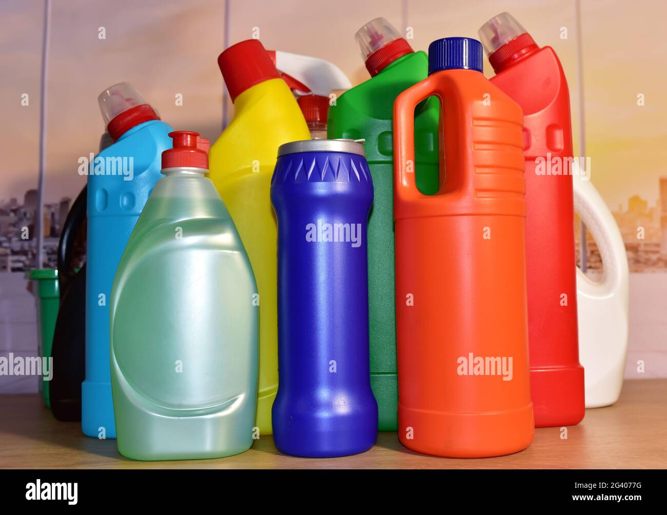 Detergent bottles at kitchen in home. Detergents and laundry concept ...