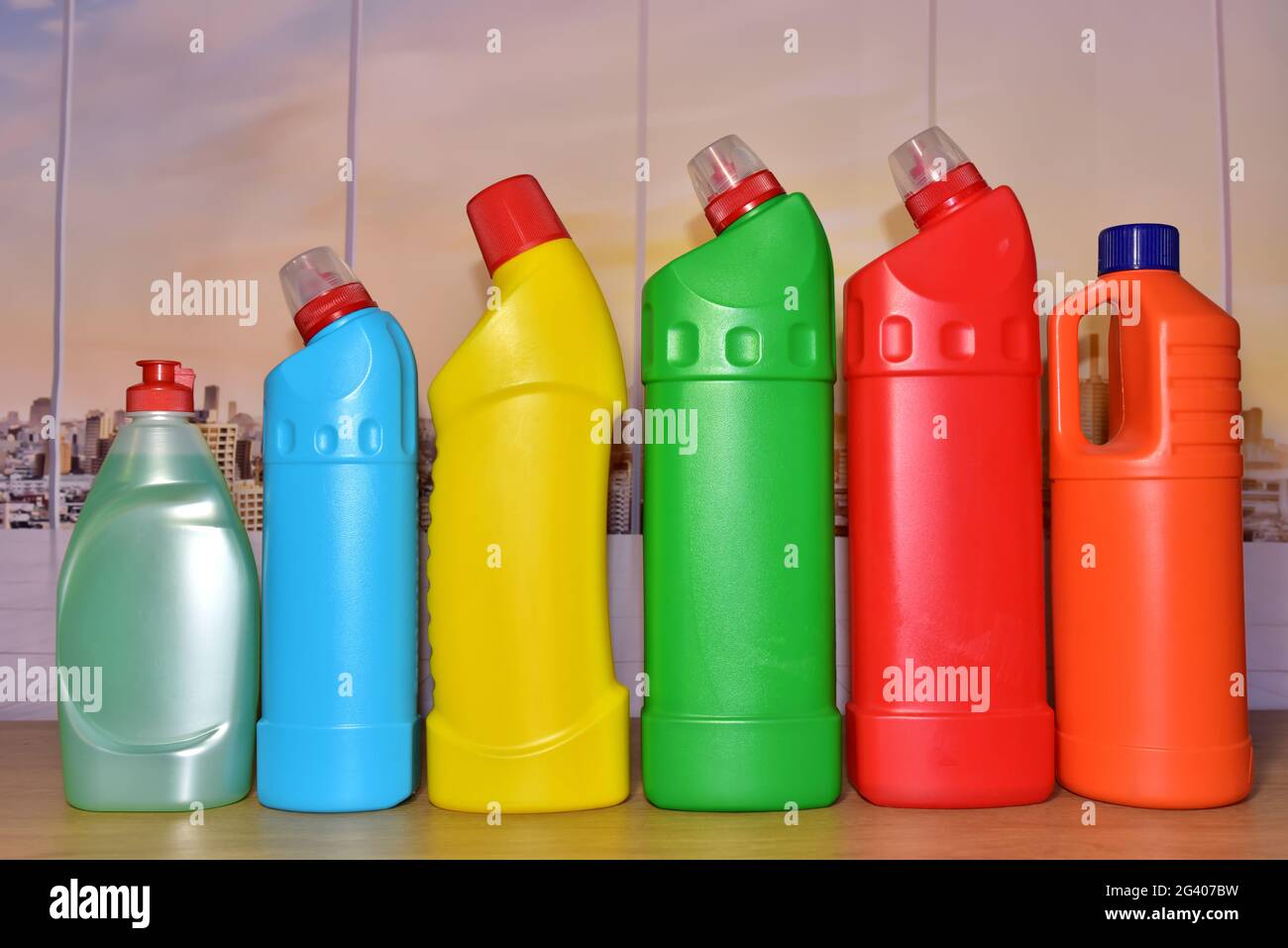 Detergent bottles at kitchen in home. Detergents and laundry concept ...